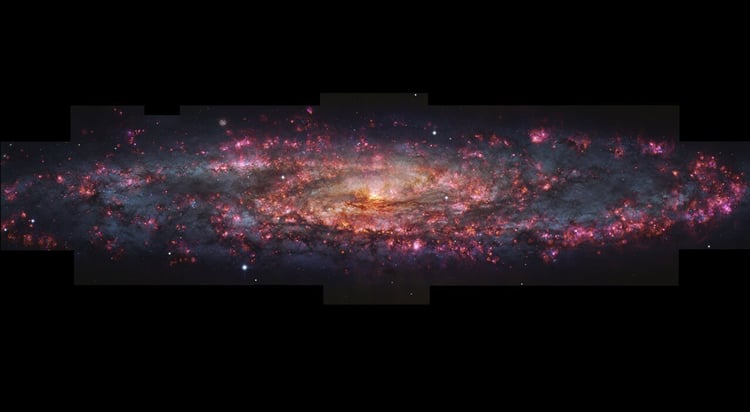 Sculptor galaxy shines in stunning multi-color image | Cybernews